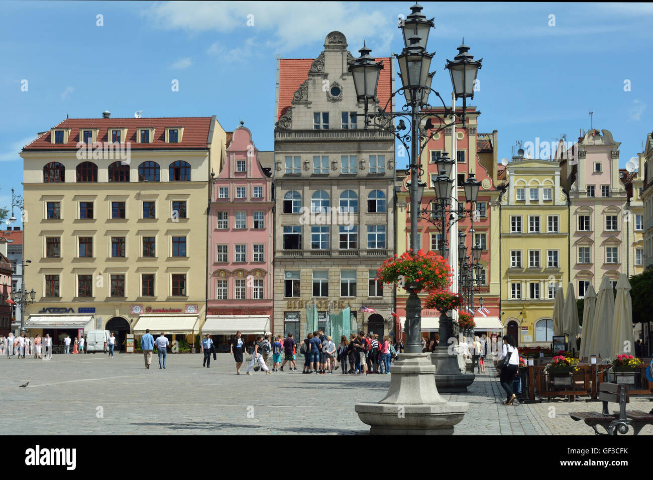 People walking in the Market Square in the historical Old Town of ...
