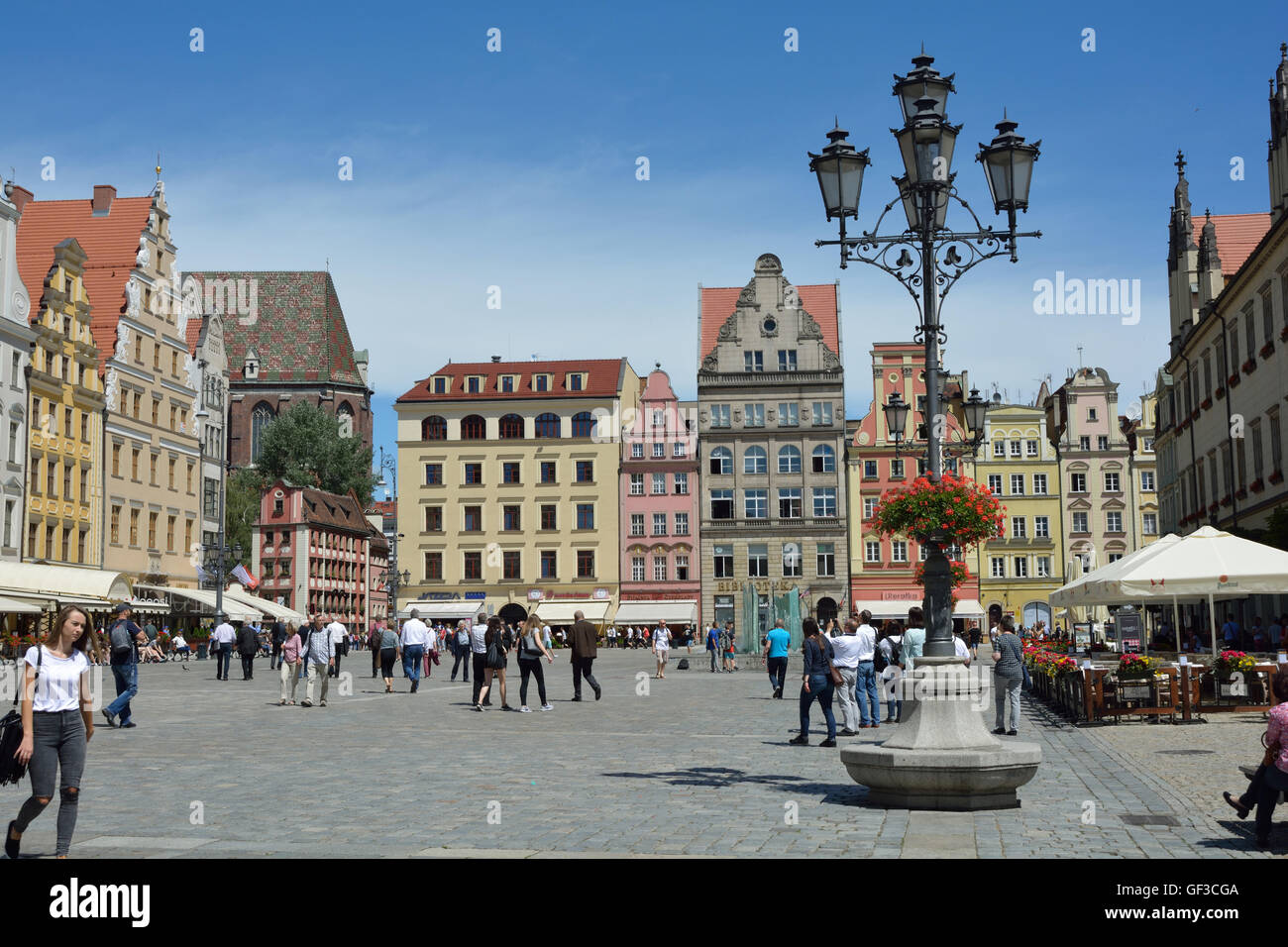 People walking in the Market Square in the historical Old Town of ...