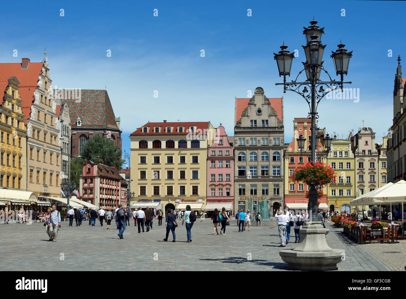 People walking in the Market Square in the historical Old Town of ...