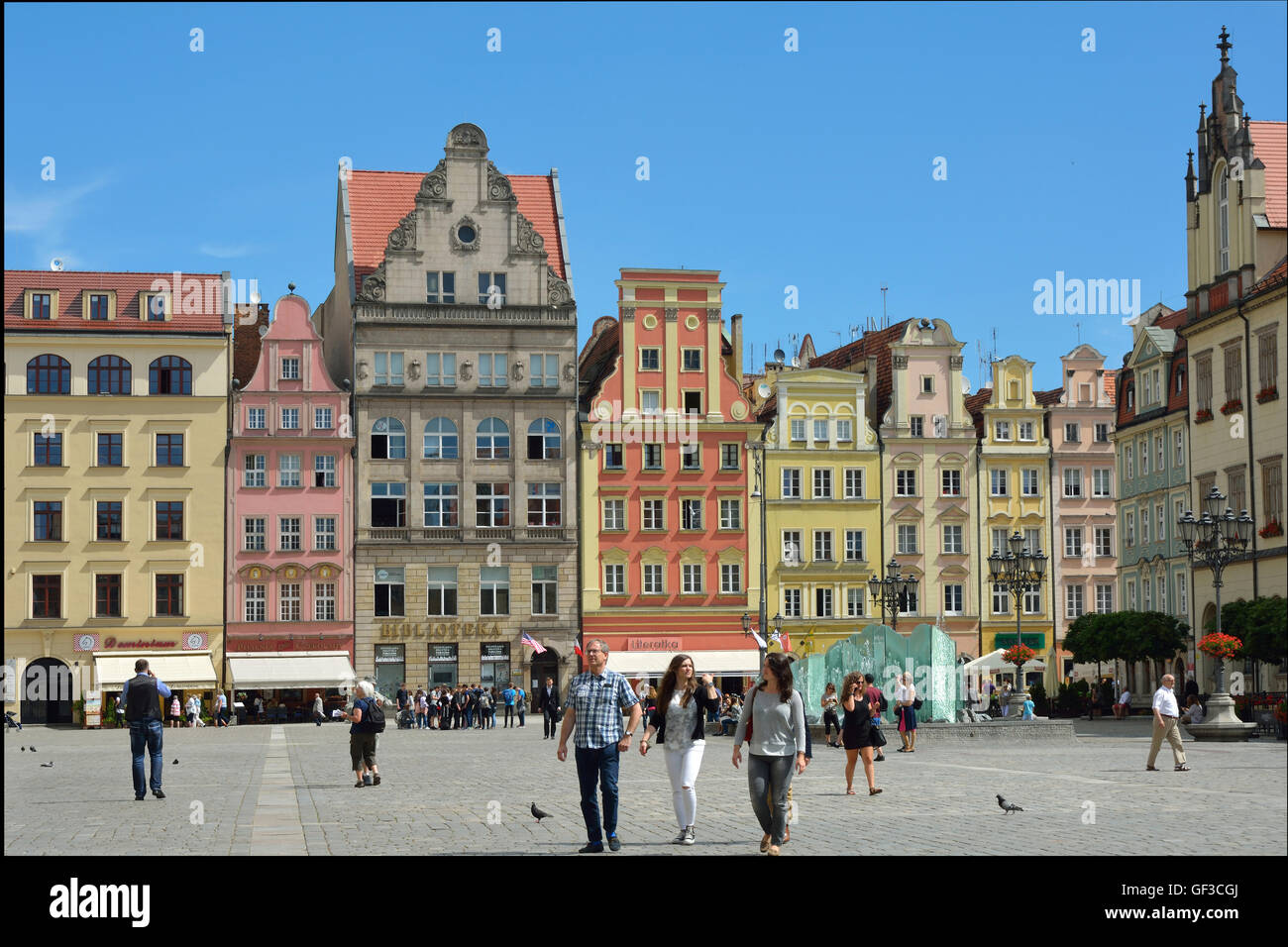 People walking in the Market Square in the historical Old Town of ...
