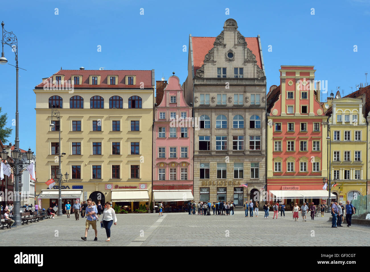 People walking in the Market Square in the historical Old Town of ...