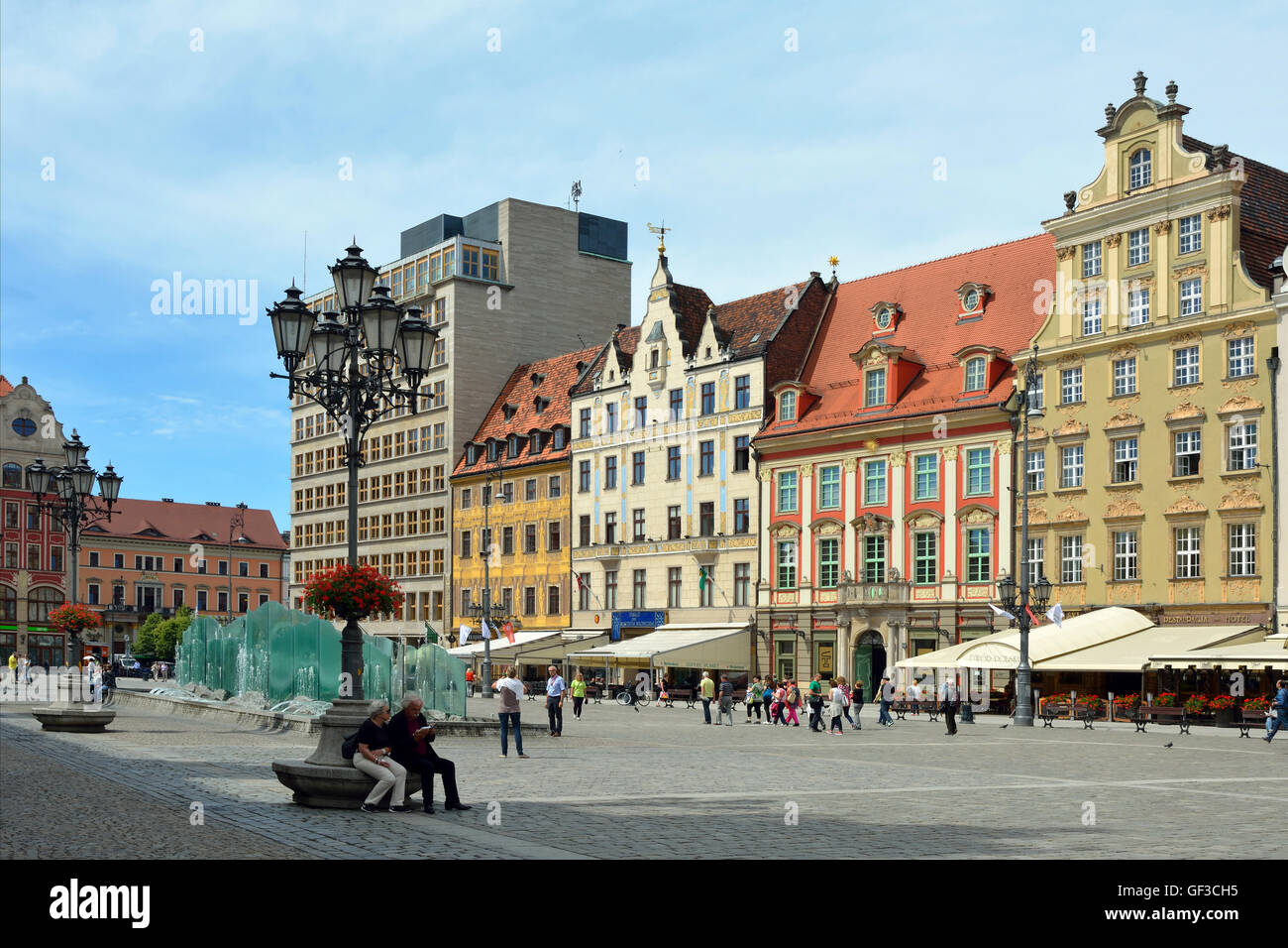 People walking in the Market Square in the historical Old Town of ...