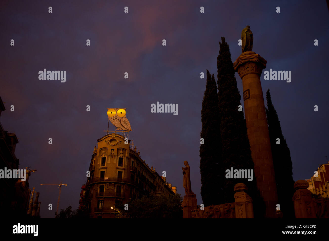 El Mussol (The Owl in catalan), an ancient ad sign, rests atop of a ...