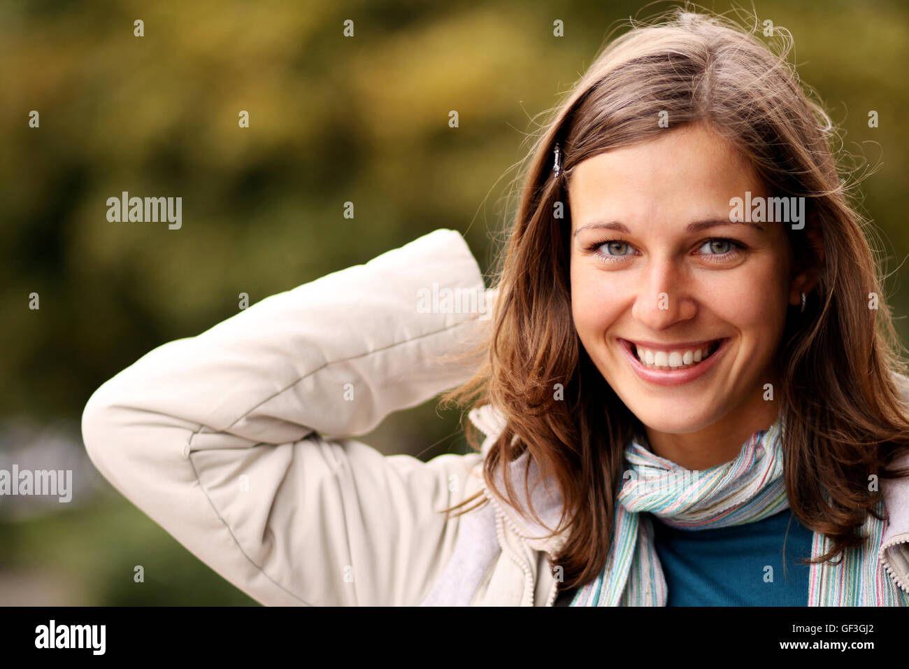 Closeup portrait of a happy young woman smiling Stock Photo - Alamy