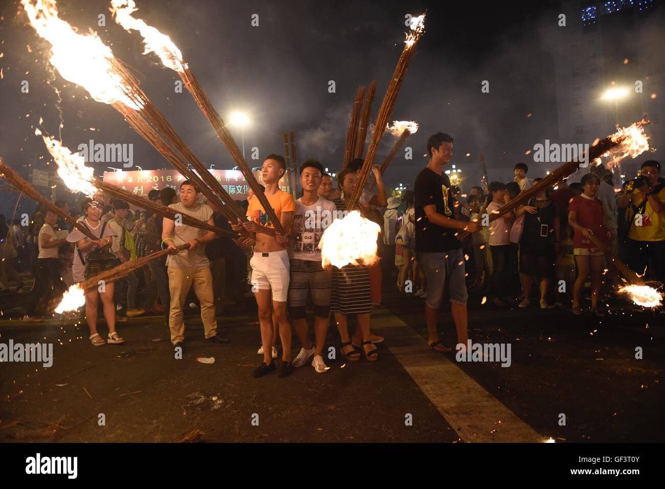 Group of people with torches hi-res stock photography and images - Alamy