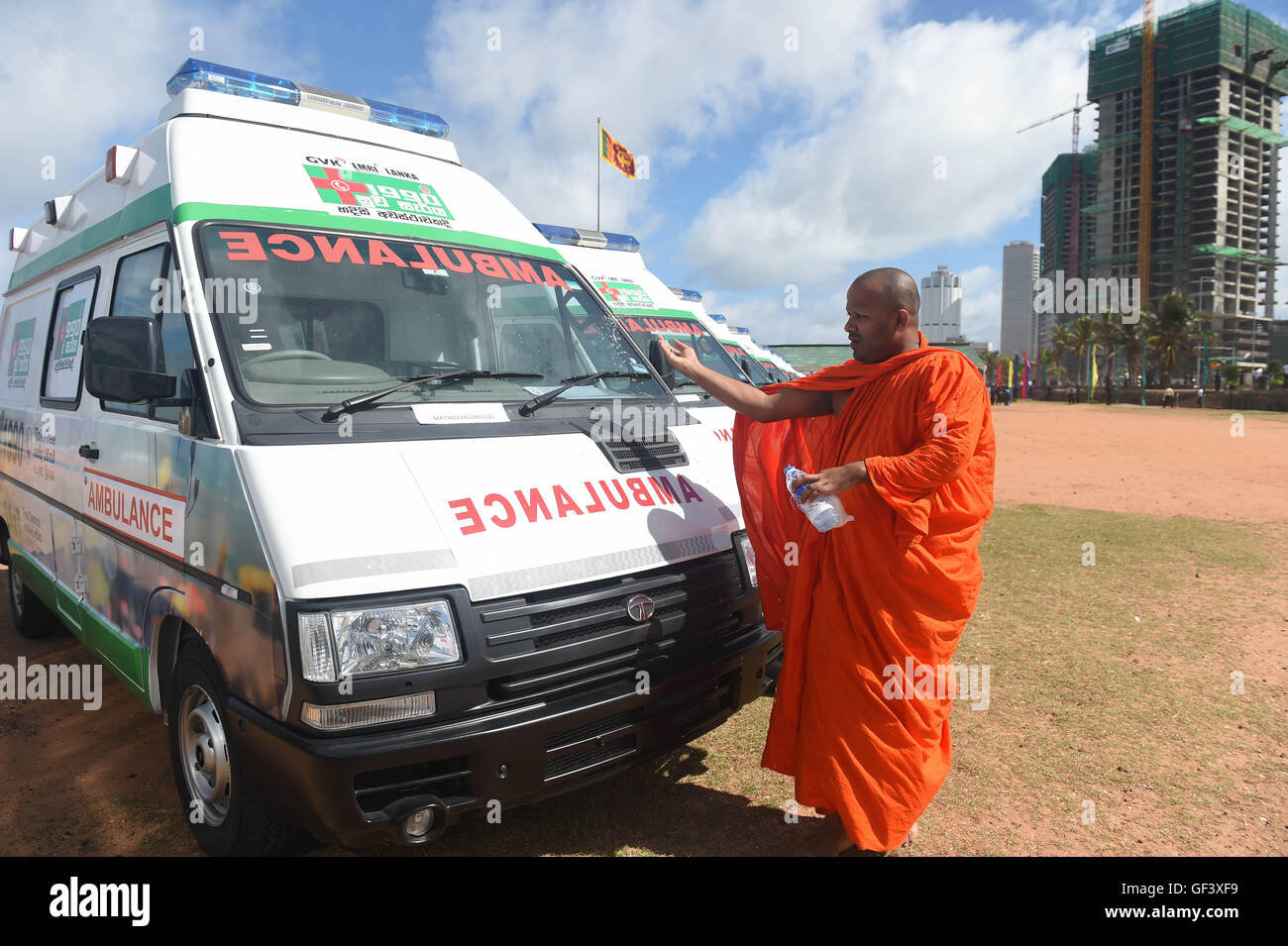 Colombo, Sri Lanka. 28th July, 2016. A Sri Lankan Buddhist monk blesses an Indian ambulance in ...