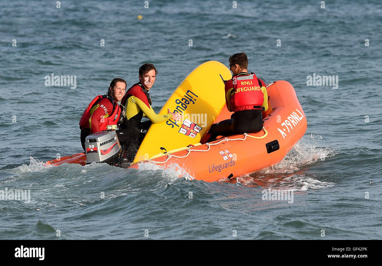 Arancia IRB (Inshore Rescue Boat) and RNLI Surf Lifeguard, Coastguard ...