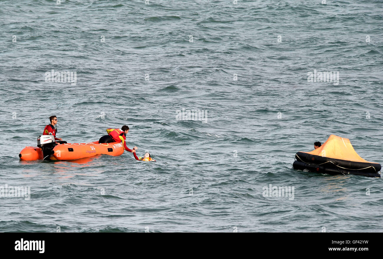 Coastguard Rescue, Arancia IRB (Inshore Rescue Boat) with a liferaft ...