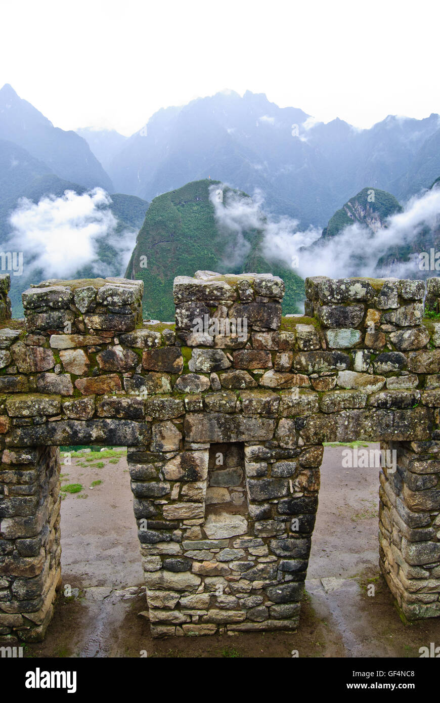 The stone work of residential section and the Andes at the background ...