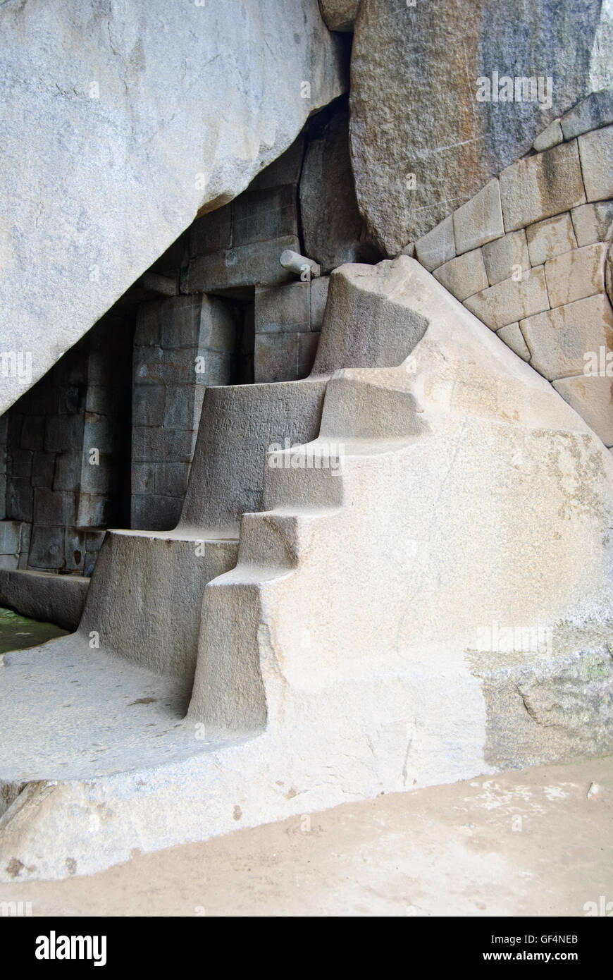 The massive boulder was sharply cut as a stair Stock Photo - Alamy