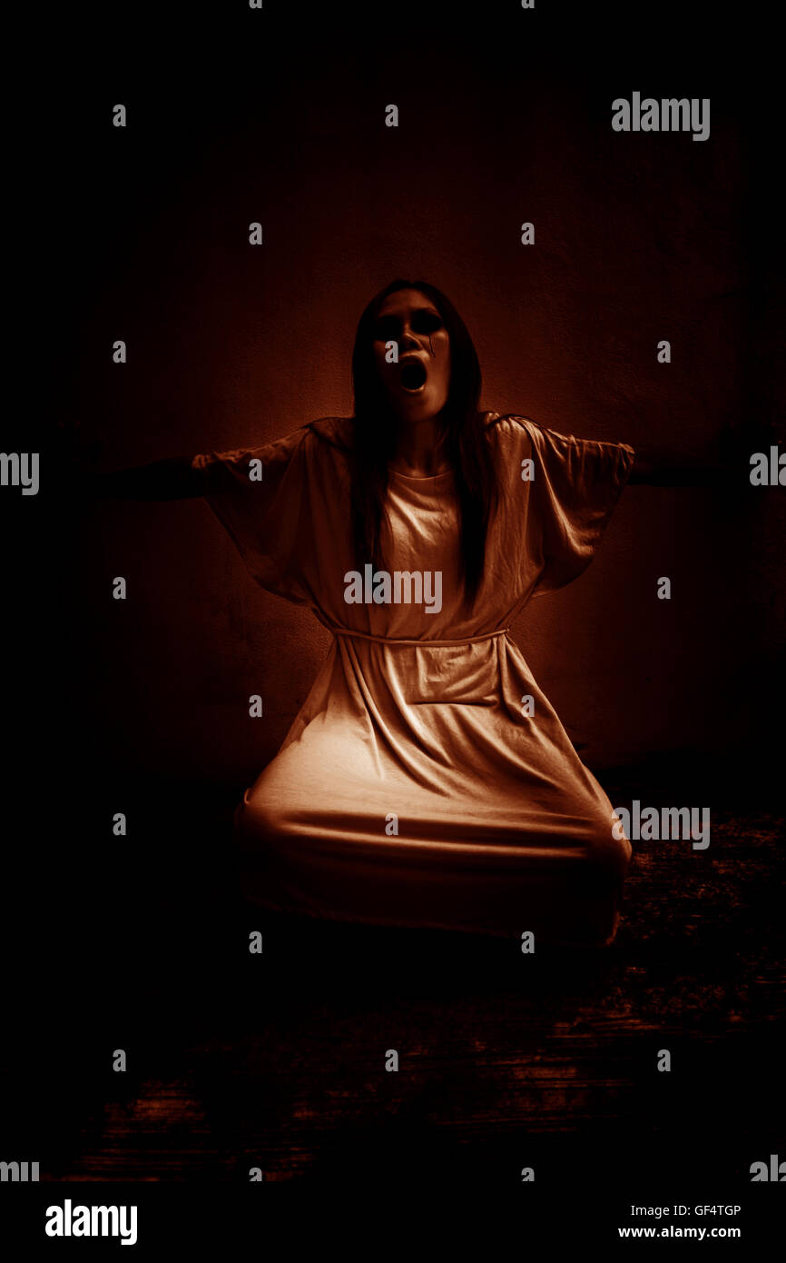 Ghost women screaming in the dark,Scary background for book cover Stock ...