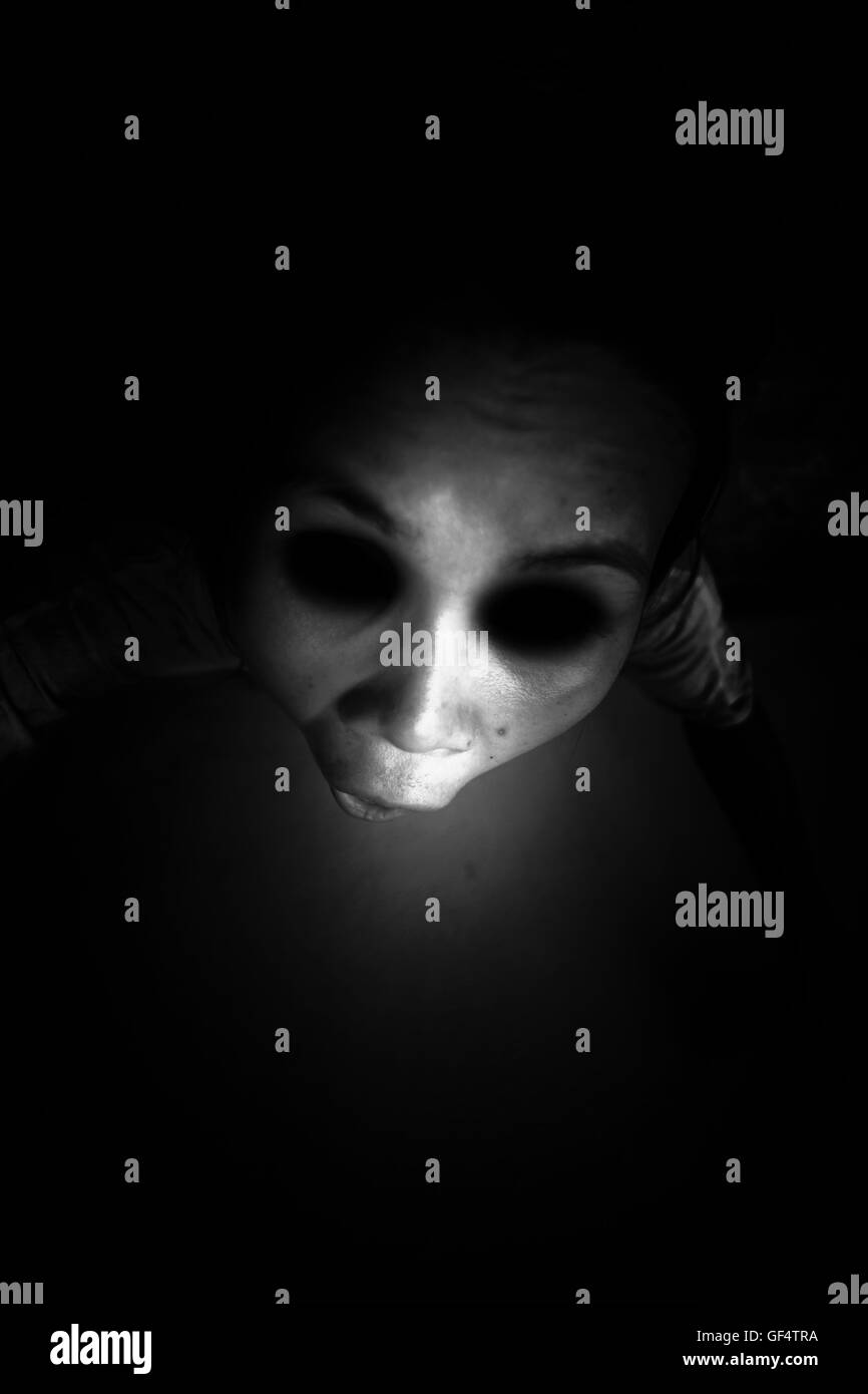 Woman with devil shadow hi-res stock photography and images - Alamy