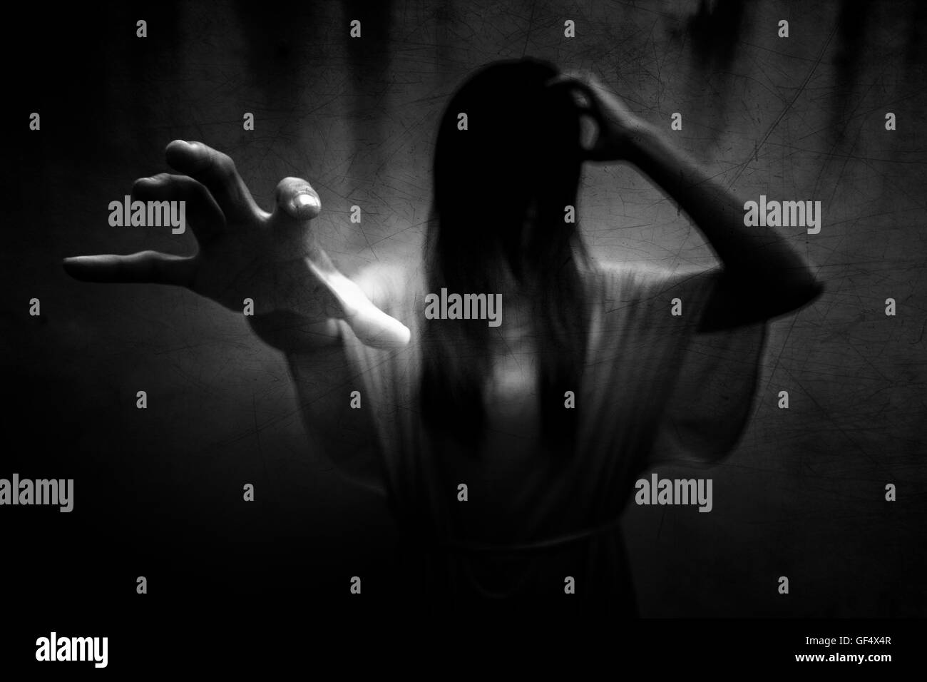 Woman with devil shadow hi-res stock photography and images - Alamy