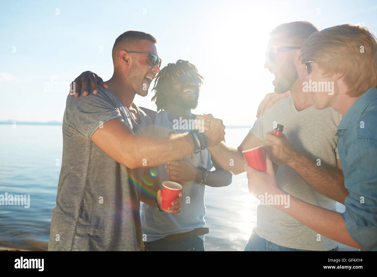 Happy guys hi-res stock photography and images - Alamy