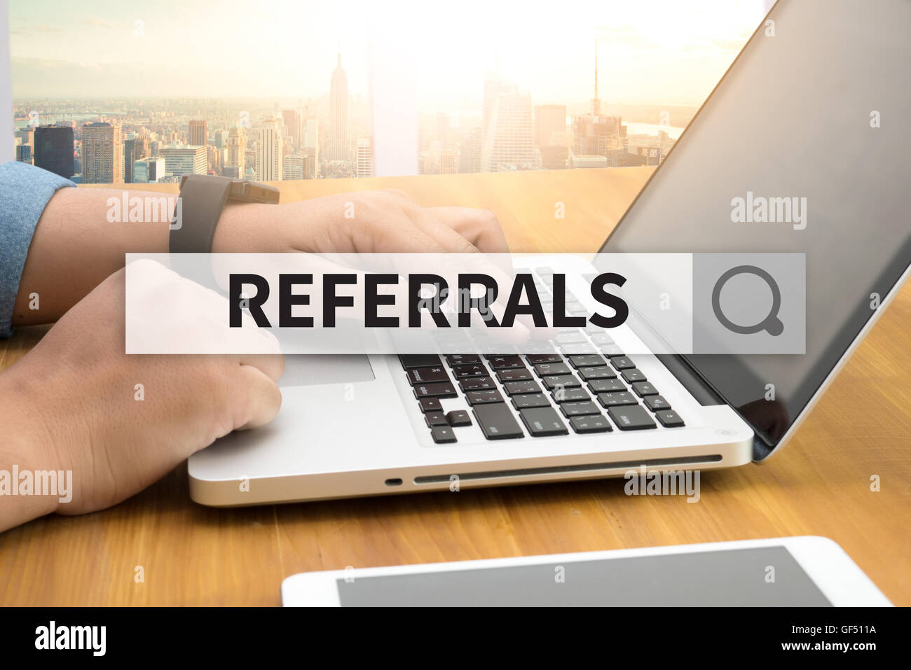 REFERRALS Business team hands at work Stock Photo - Alamy