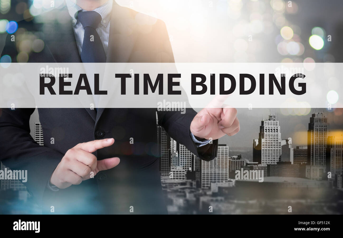 REAL TIME BIDDING and businessman working with modern technology Stock ...