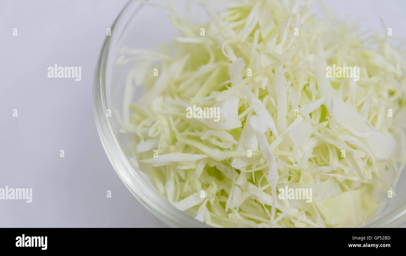 Cabbage cut into small in a white ceramic cup Stock Photo - Alamy