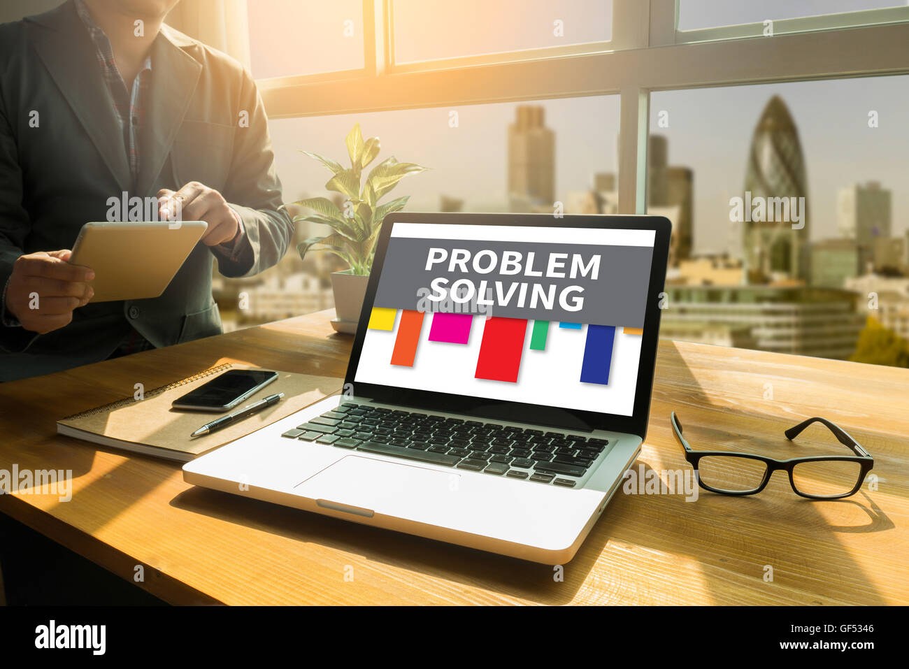 PROBLEM SOLVING Thoughtful male person looking to the digital tablet ...