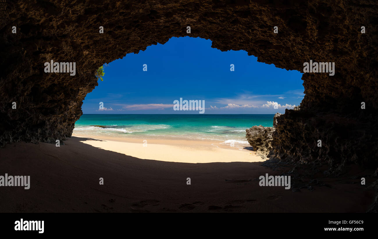 Amazing view from mountain cave to the tropical beach Stock Photo - Alamy