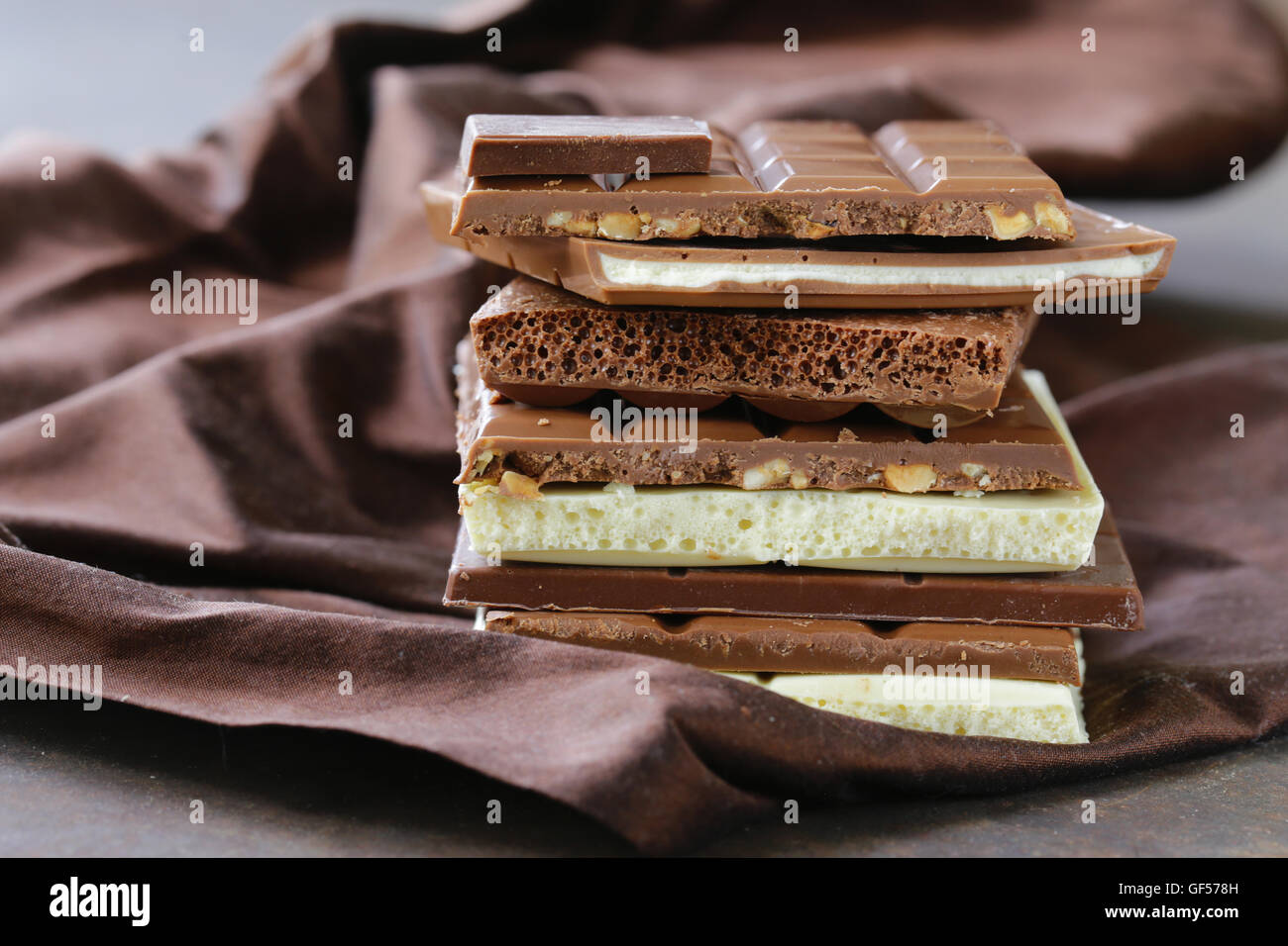 different chocolate bars - white, milk, black and nuts Stock Photo - Alamy