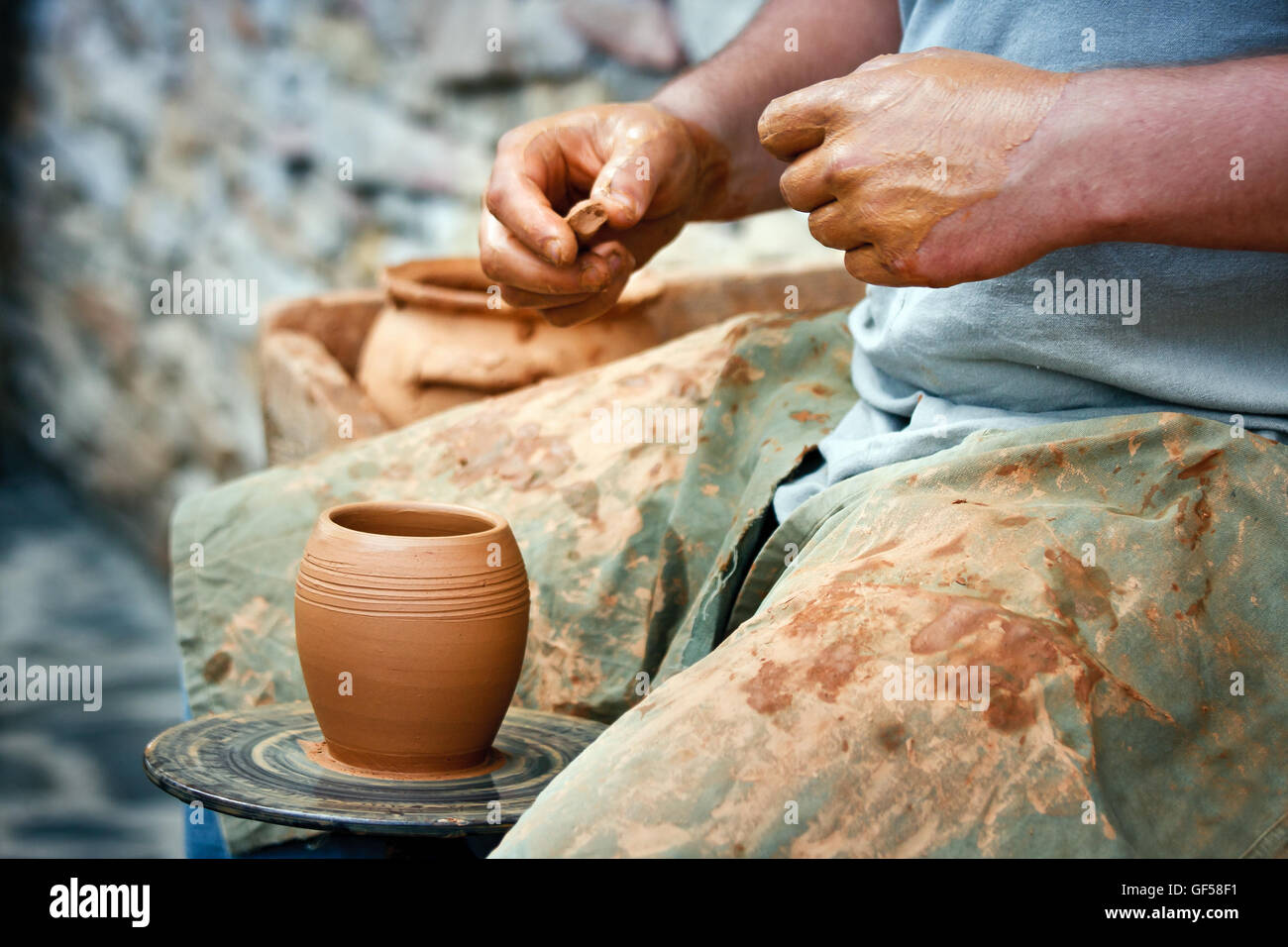 Ancient pottery wheel hi-res stock photography and images - Alamy