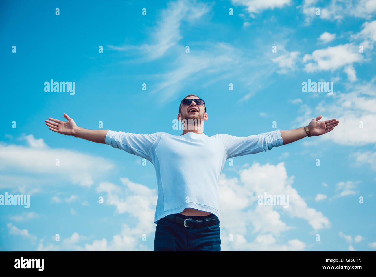 The man held out his hands to the sky. Freedom Stock Photo - Alamy