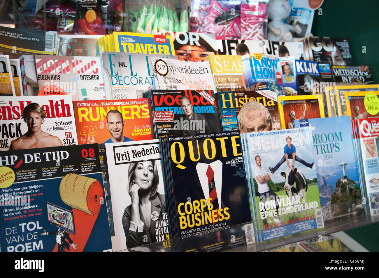 AMSTERDAM, HOLLAND - SEPTEMBER 20, 2014: Several colored magazines ...