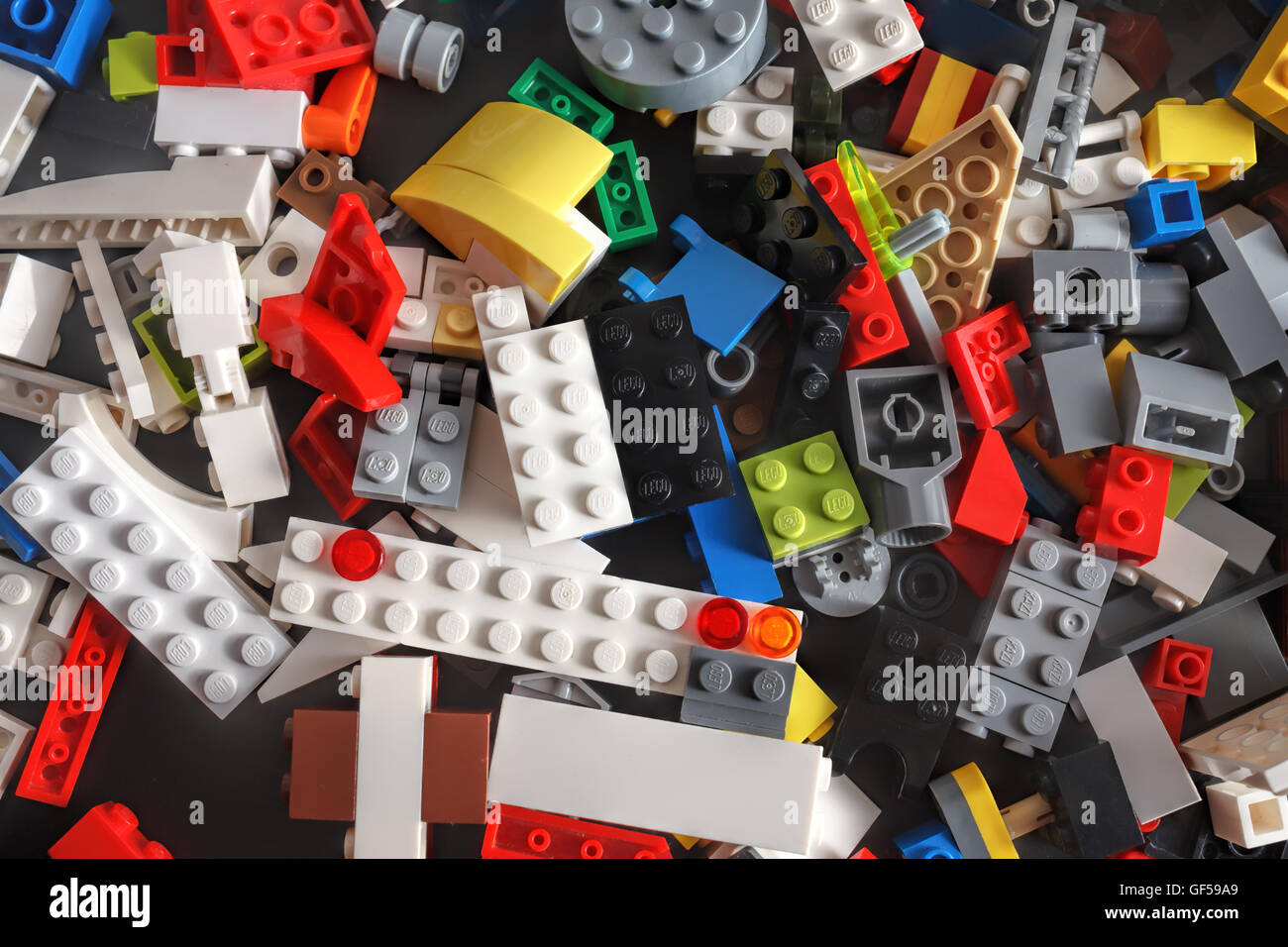 a pile of LEGO parts in different shapes and colors Stock Photo - Alamy