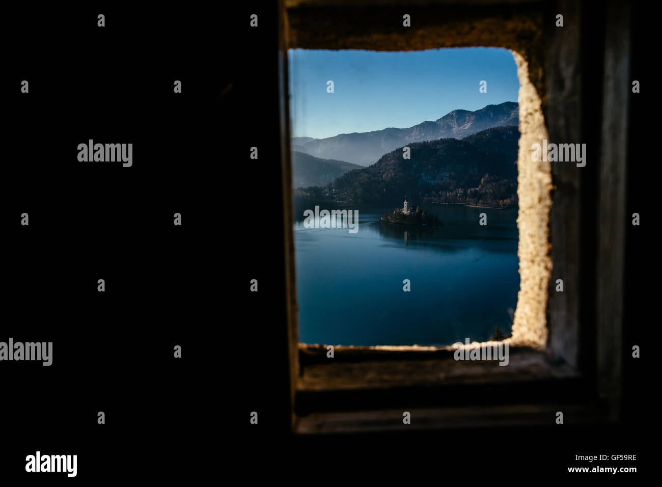 View from a small window in Castle Bled, looking out onto Lake Bled and ...