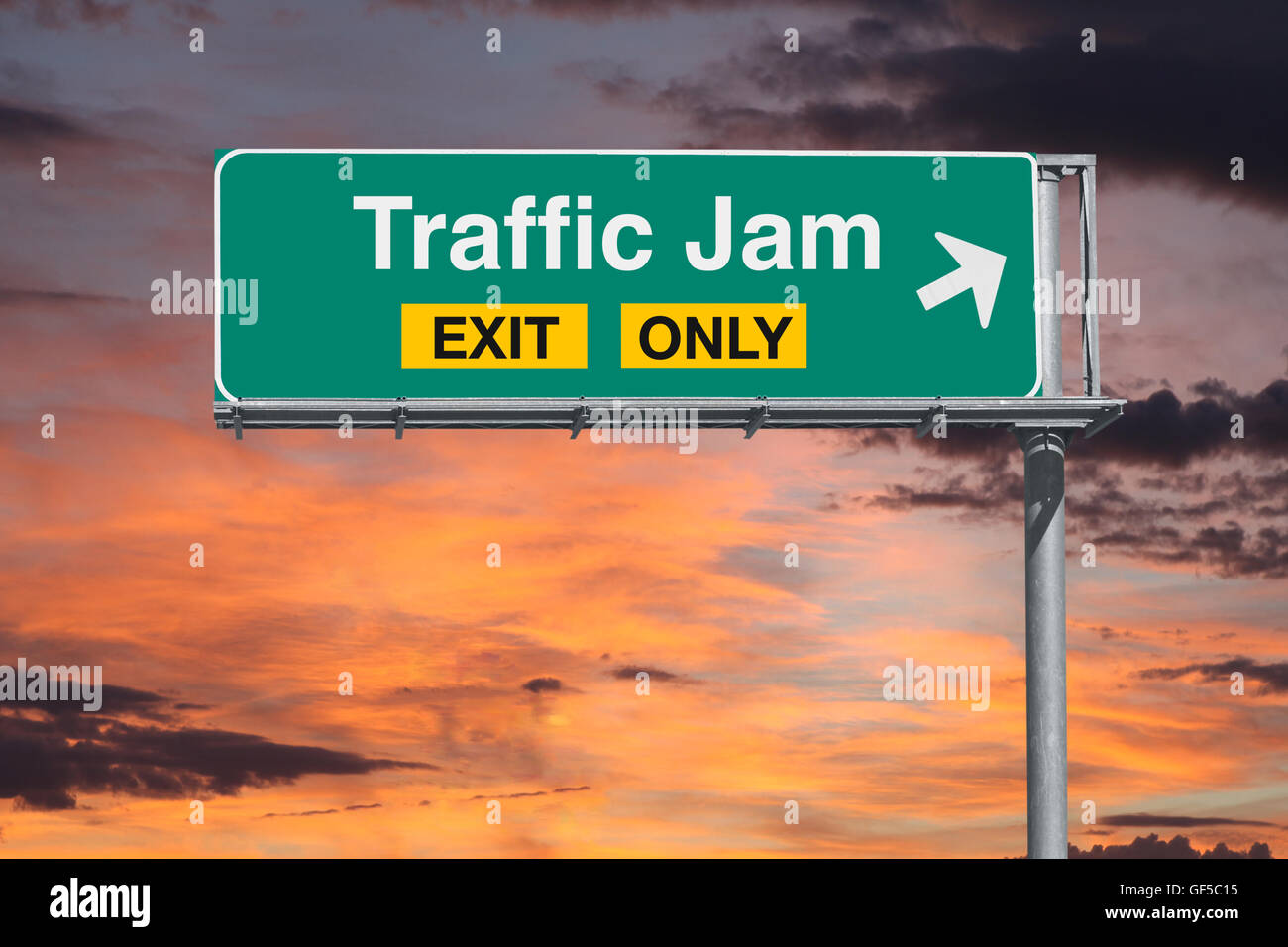 Traffic jam exit only freeway sign with sunrise sky Stock Photo - Alamy
