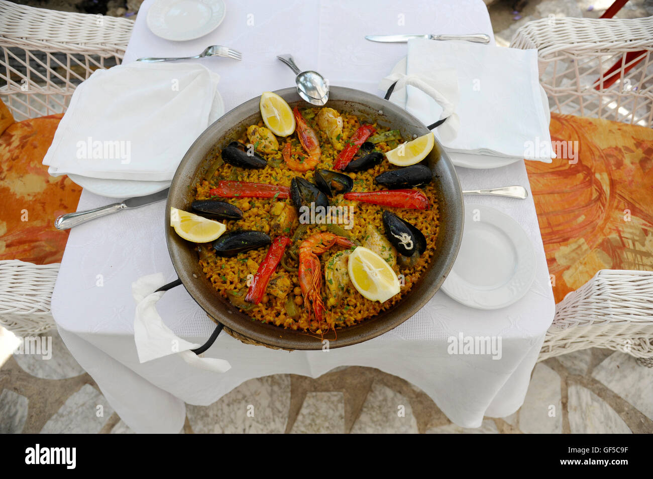 paella on the restaurant table Stock Photo - Alamy