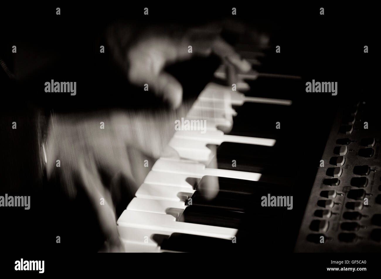 piano player hitting the keyboard Stock Photo - Alamy