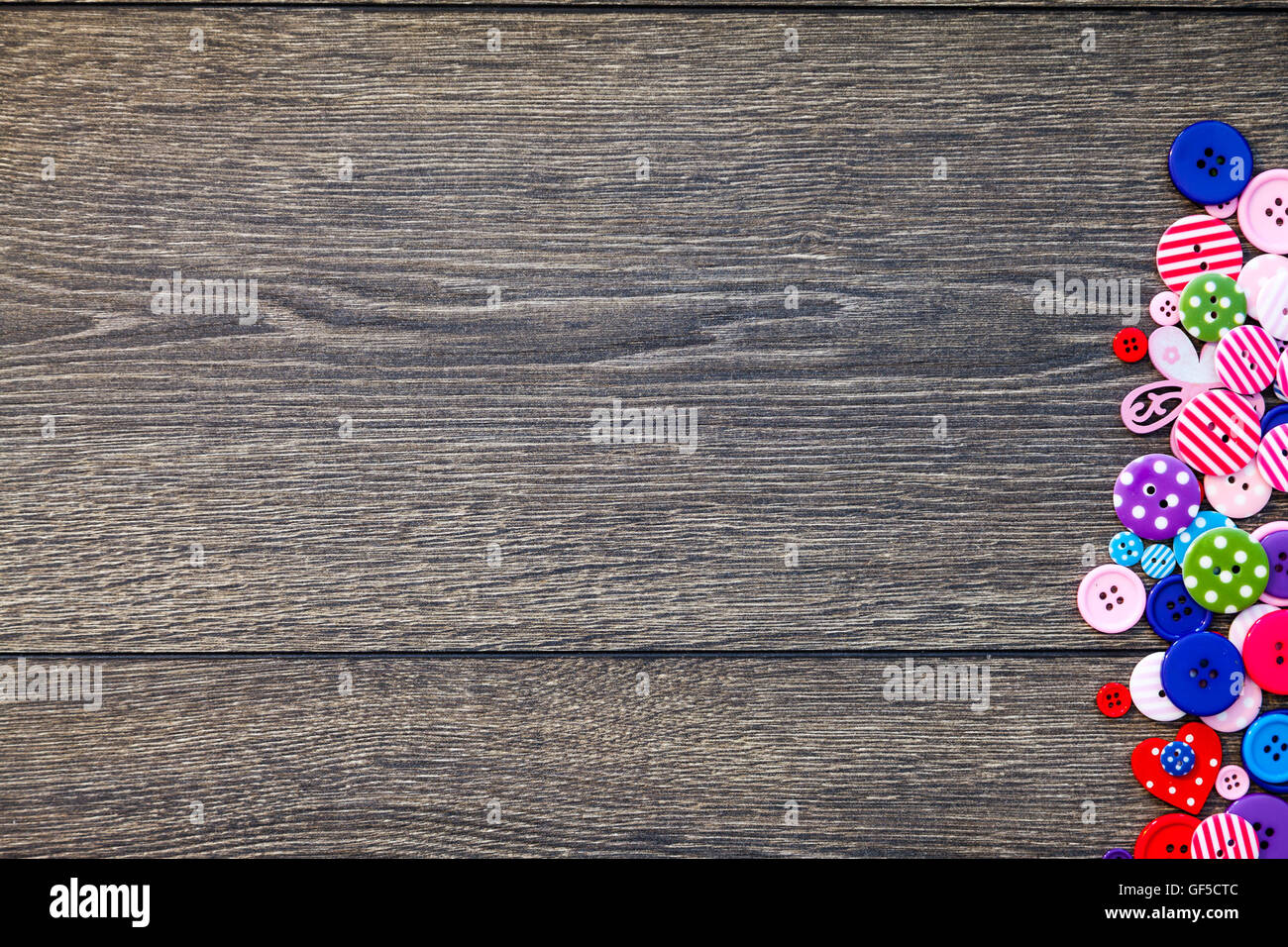 background of a wooden board and sewing buttons Stock Photo - Alamy