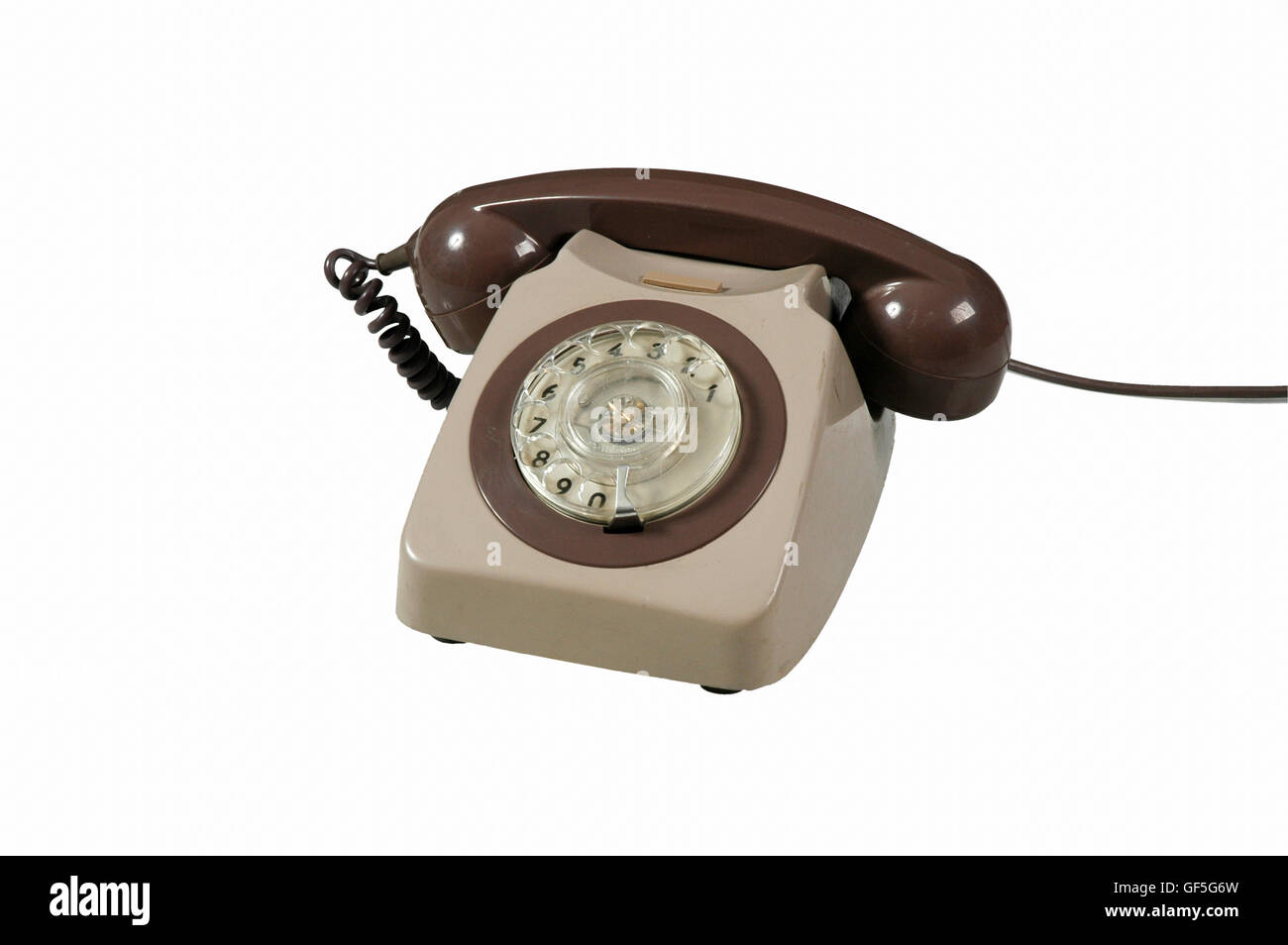 Old style dial telephone on white background Stock Photo - Alamy