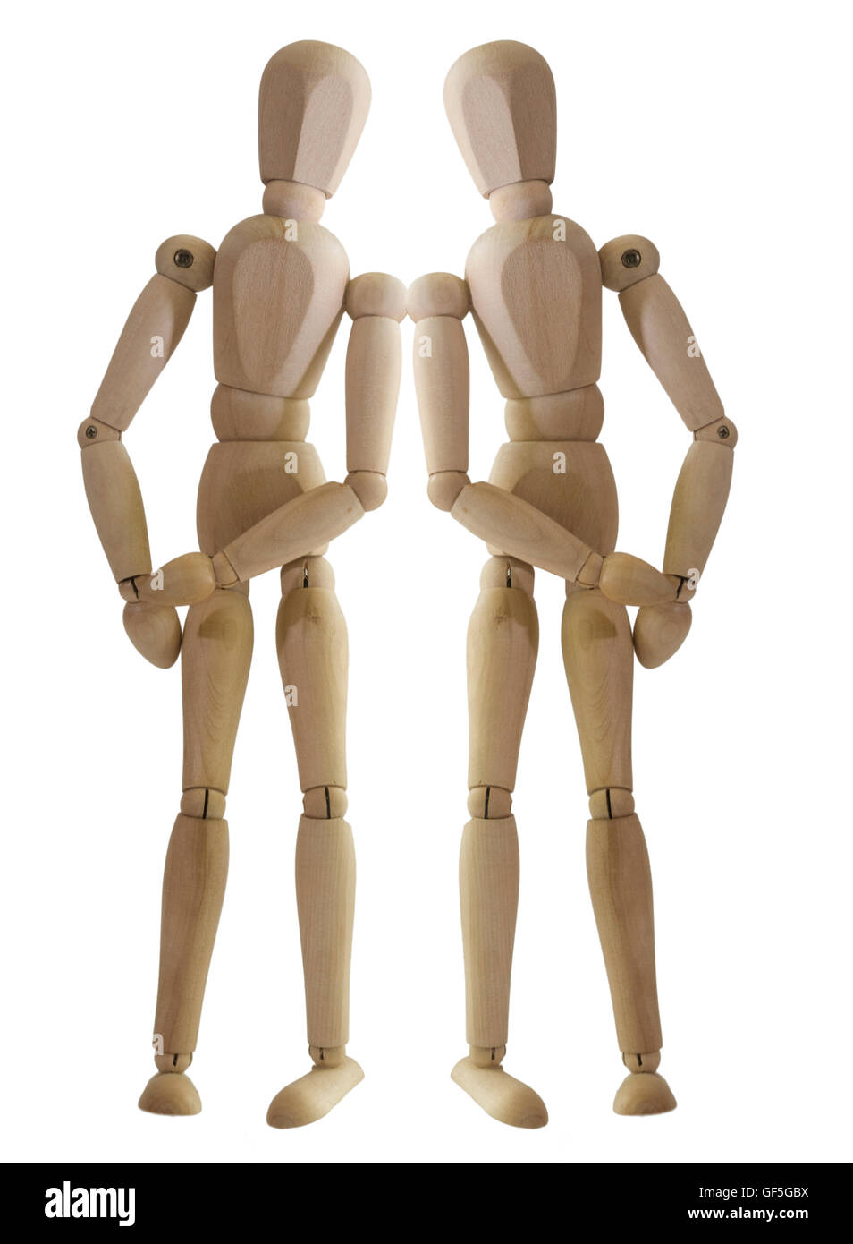 Posed artist manikin on white background supporting each other Stock ...