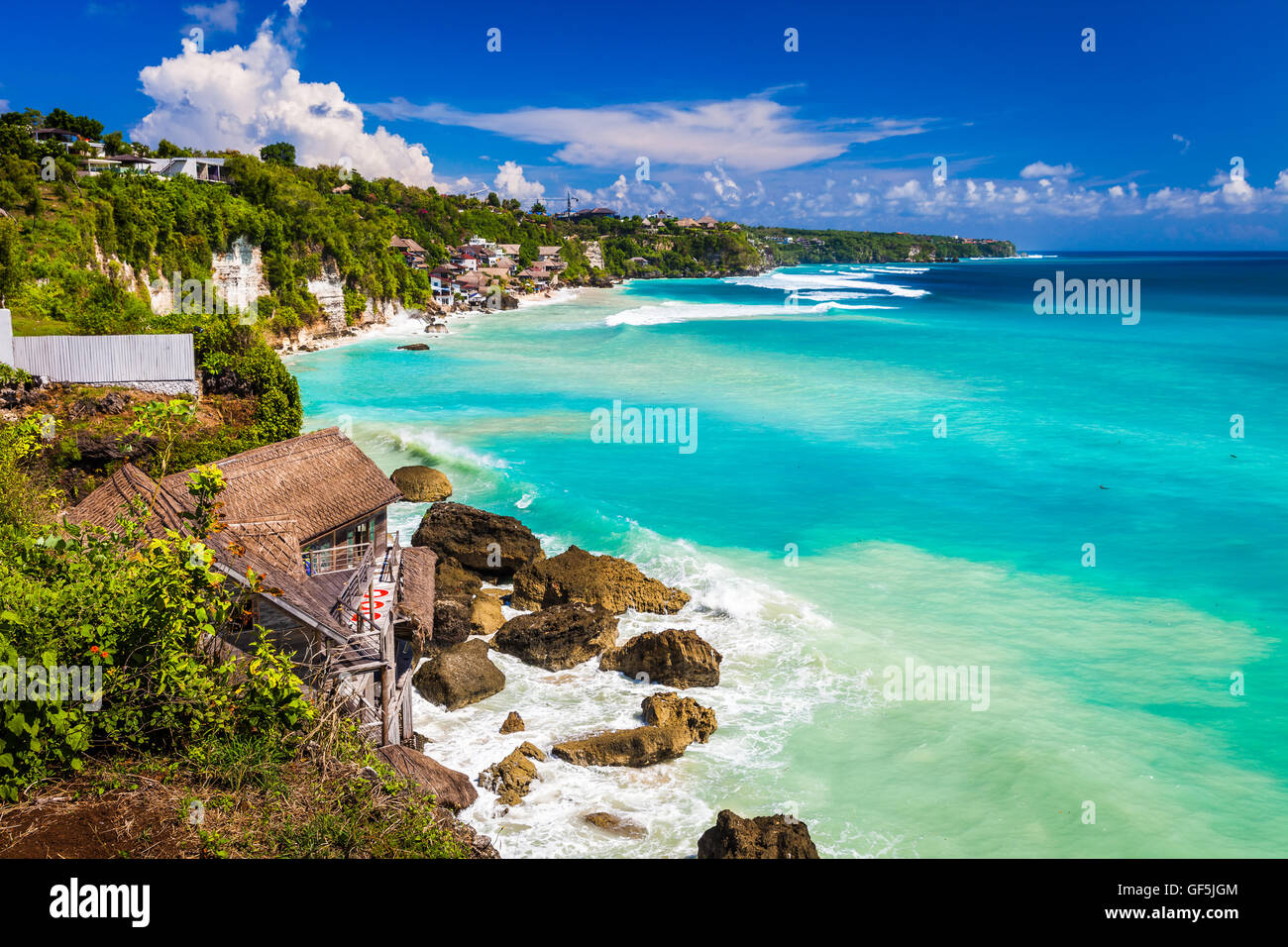 Azure beach with rocky mountains and clear water of Indian ocean at ...