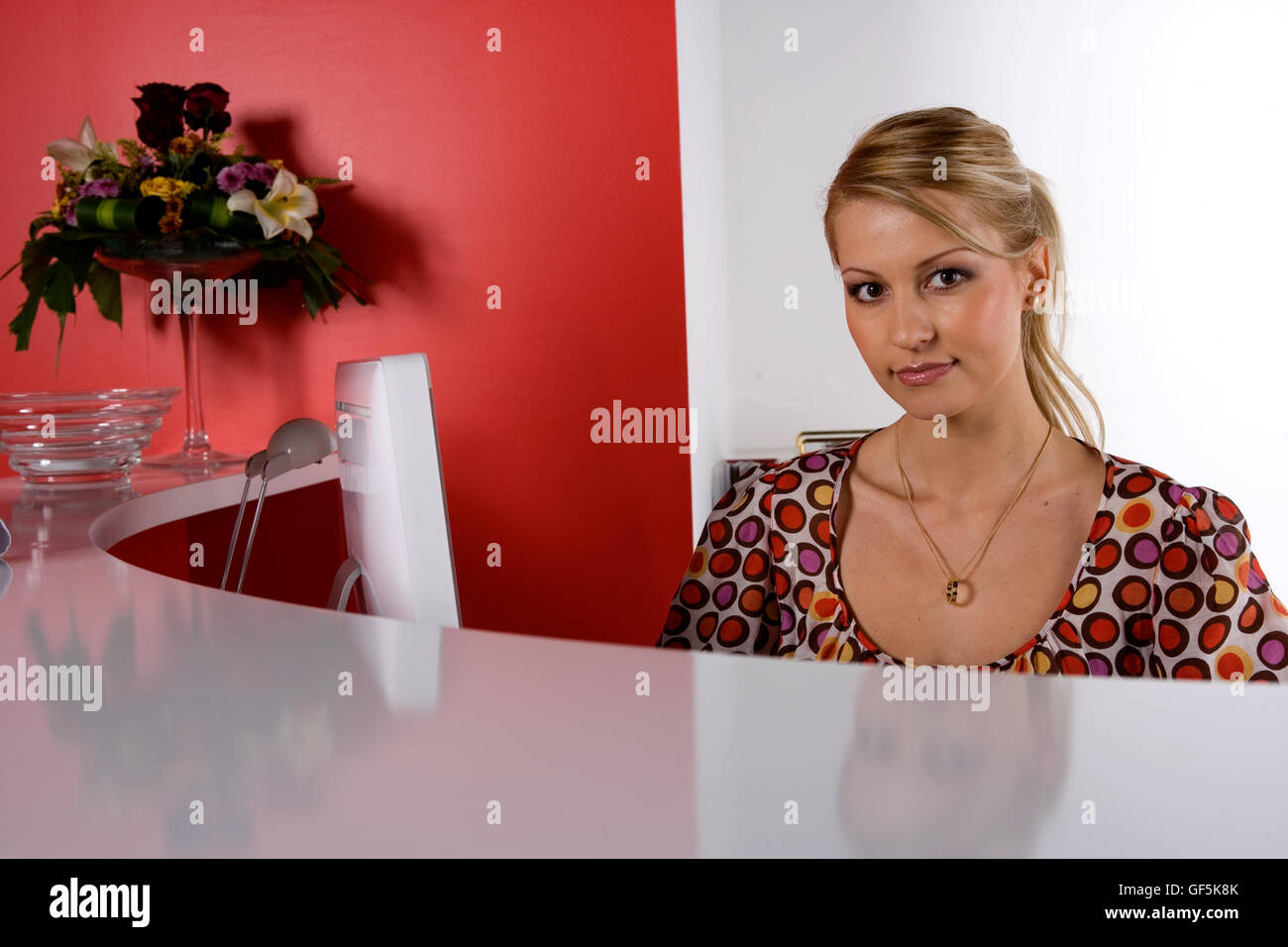 Profile of a female office receptionist Stock Photo - Alamy