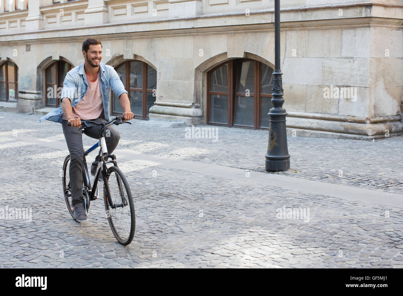 Man on bicycle smart watch hi-res stock photography and images - Alamy