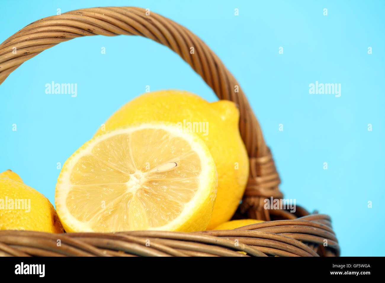 lemon in basket Stock Photo - Alamy