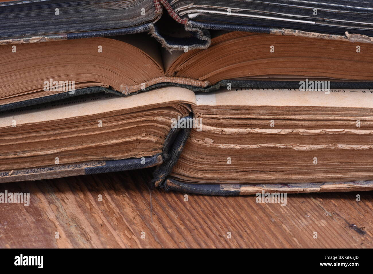 Stack of old open books closeup Stock Photo - Alamy