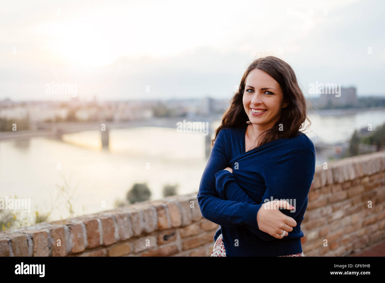 Beautiful woman feeling cold in autumn Stock Photo - Alamy