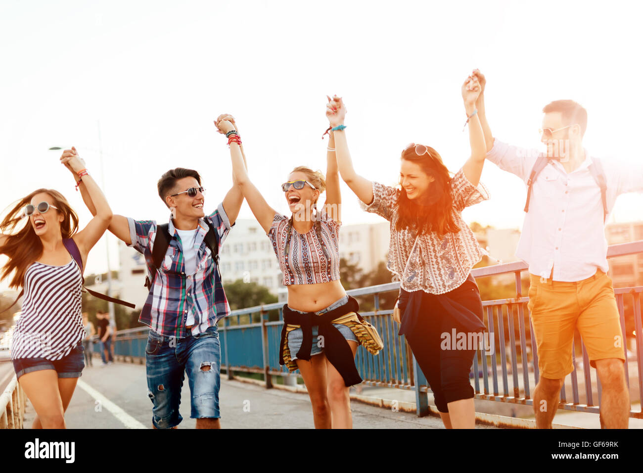 Happy energetic, young people having fun Stock Photo - Alamy