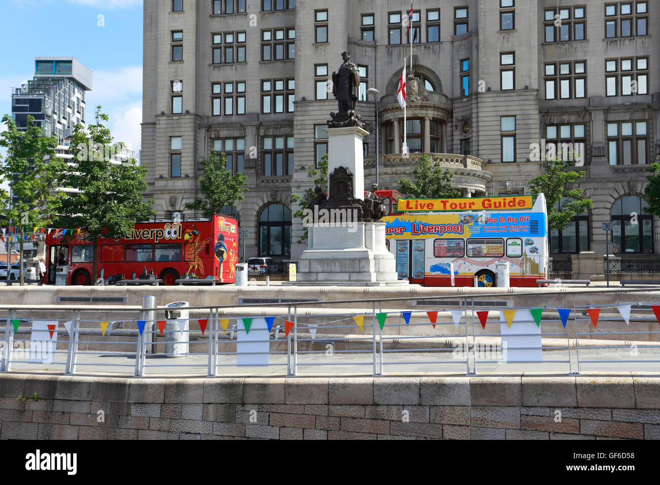 Open top tour buses outside the Royal Liver Building, Liverpool ...