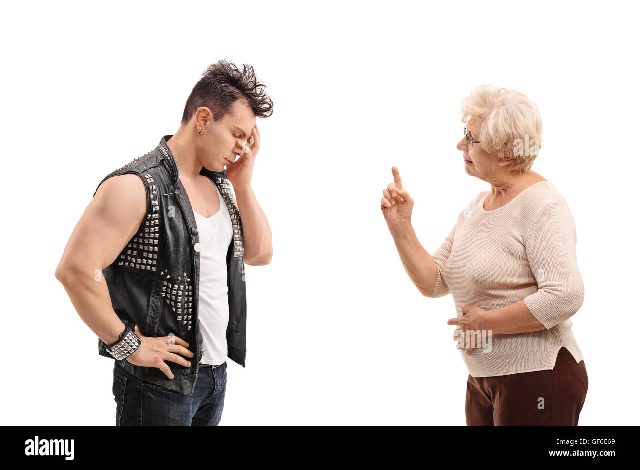 Senior woman arguing with a punker isolated on white background Stock ...