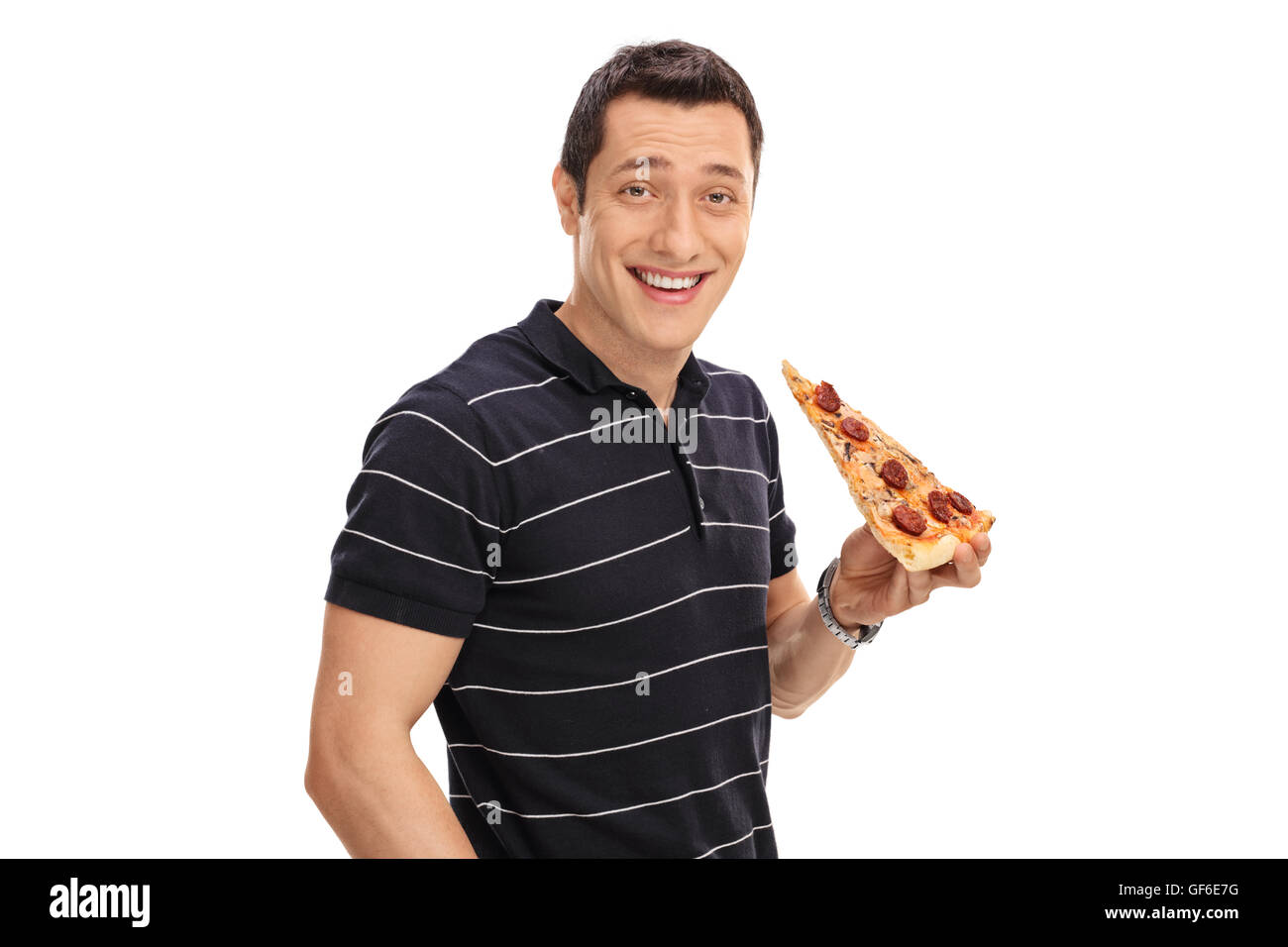 Young man having a slice of pizza isolated on white background Stock ...