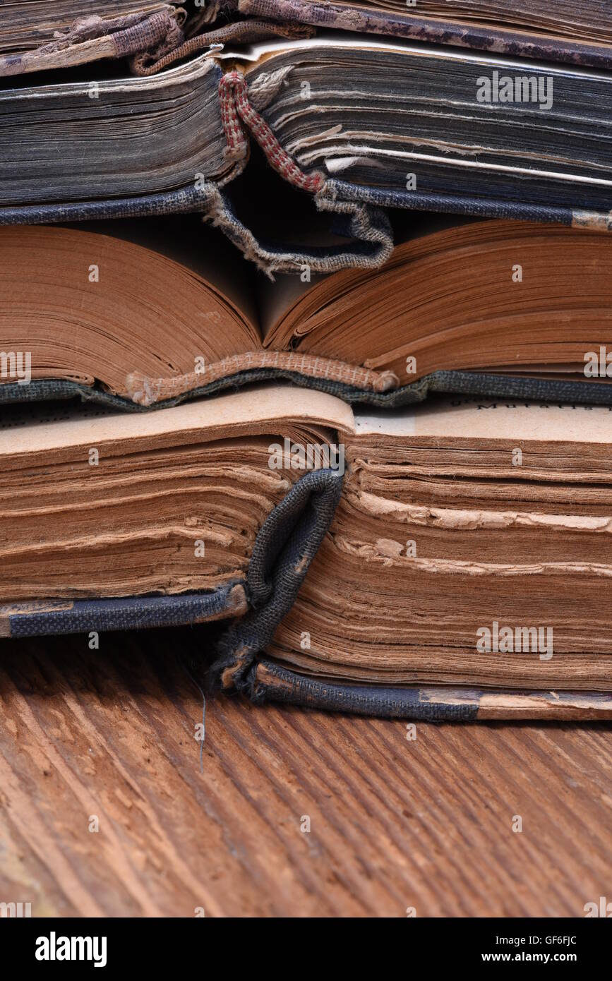 Stack of old open books closeup Stock Photo - Alamy
