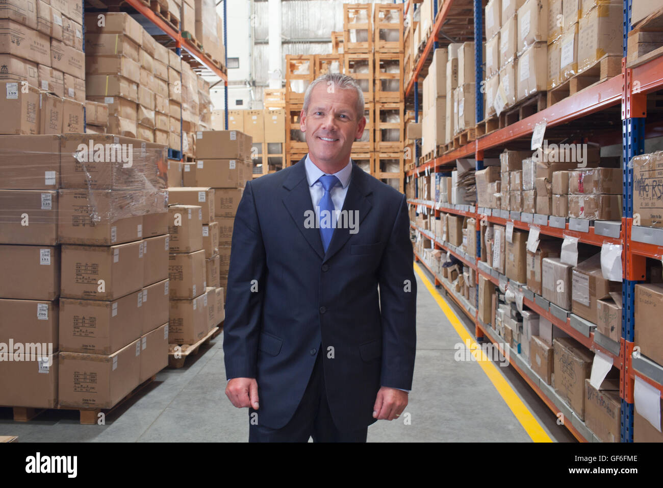 Man in warehouse Stock Photo - Alamy