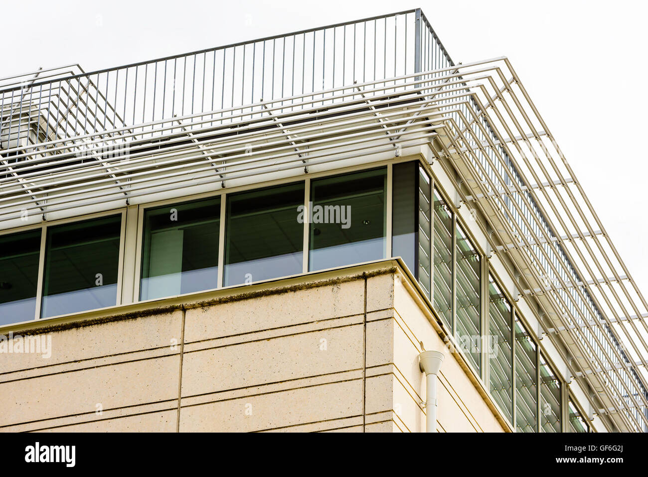 Angled planks make a good sunscreen on the corner of an office building ...