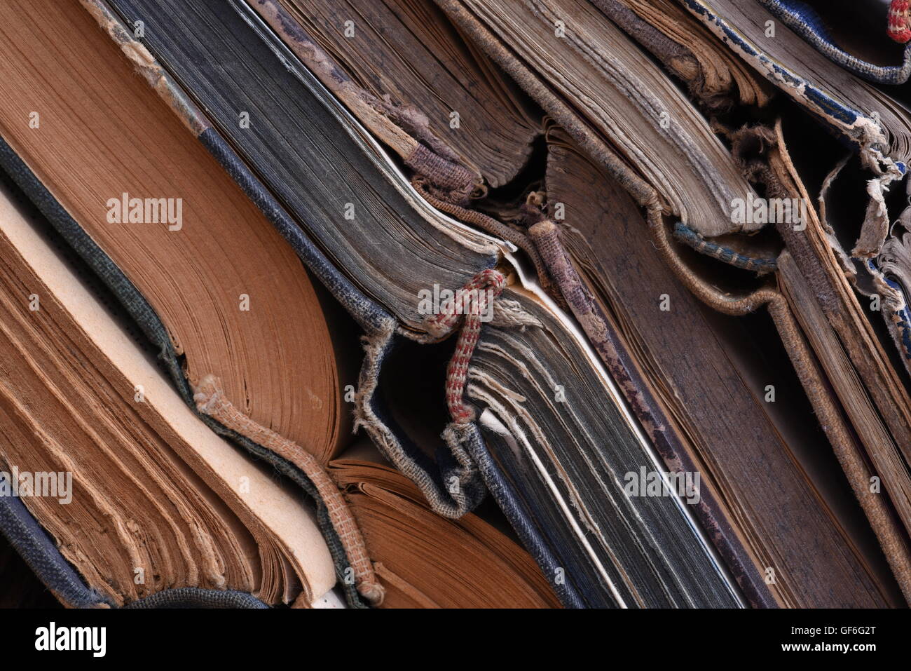 Stack of old open books closeup Stock Photo - Alamy