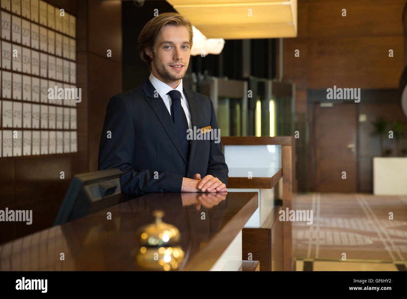 Hotel receptionist tablet hi-res stock photography and images - Alamy